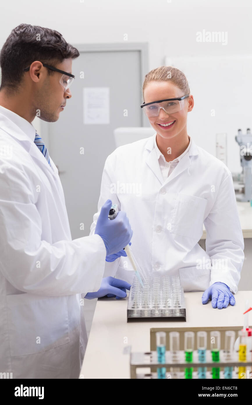 Team young scientists in laboratory hi-res stock photography and images ...