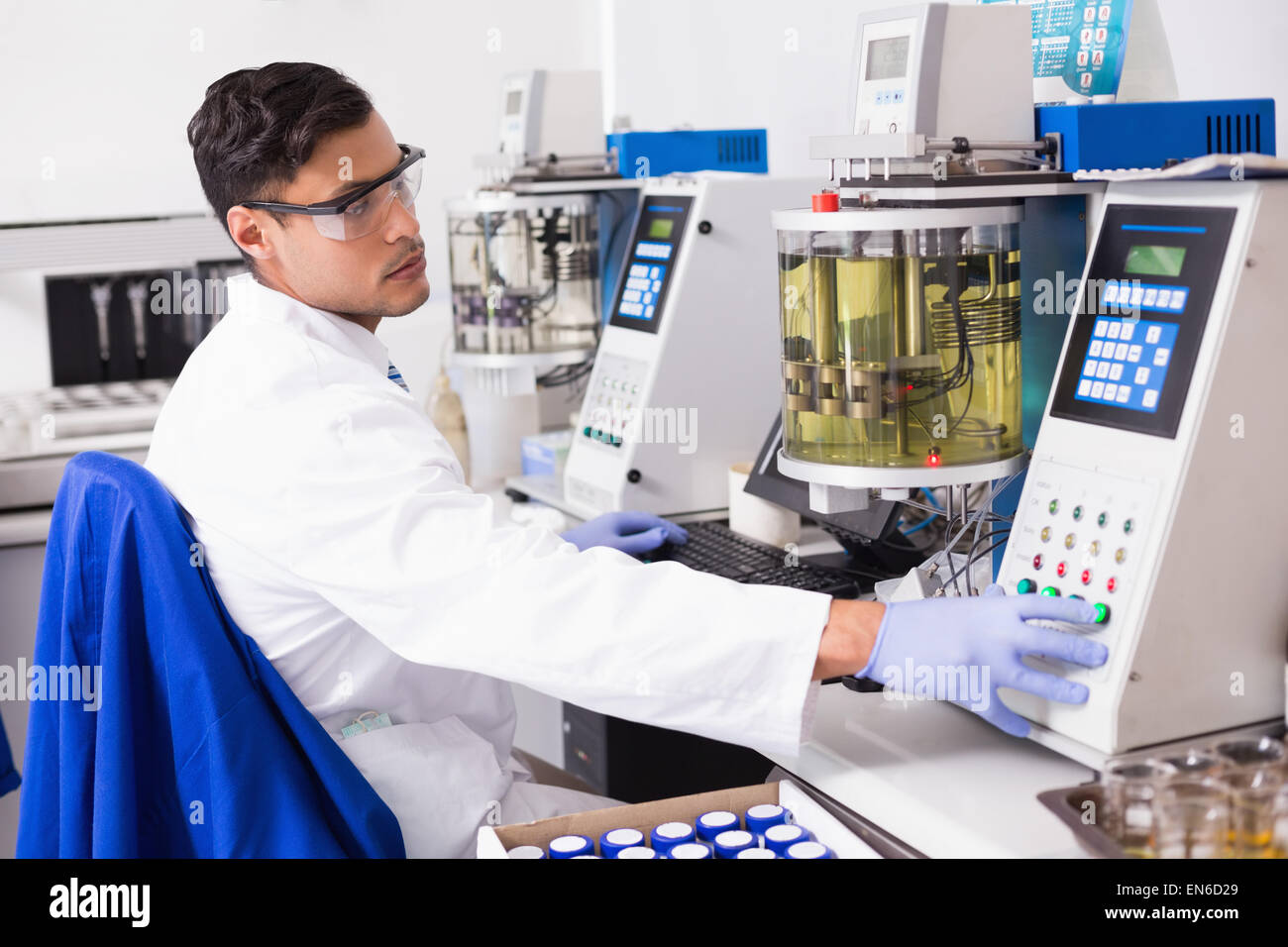 Concentrated scientist working with computer Stock Photo - Alamy