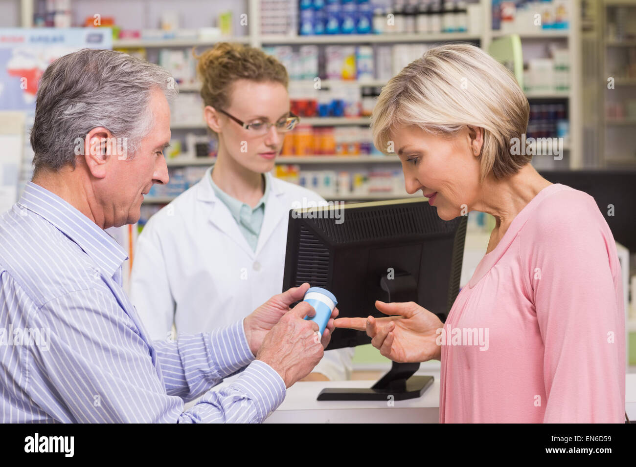 Costumers talking about medicine Stock Photo - Alamy