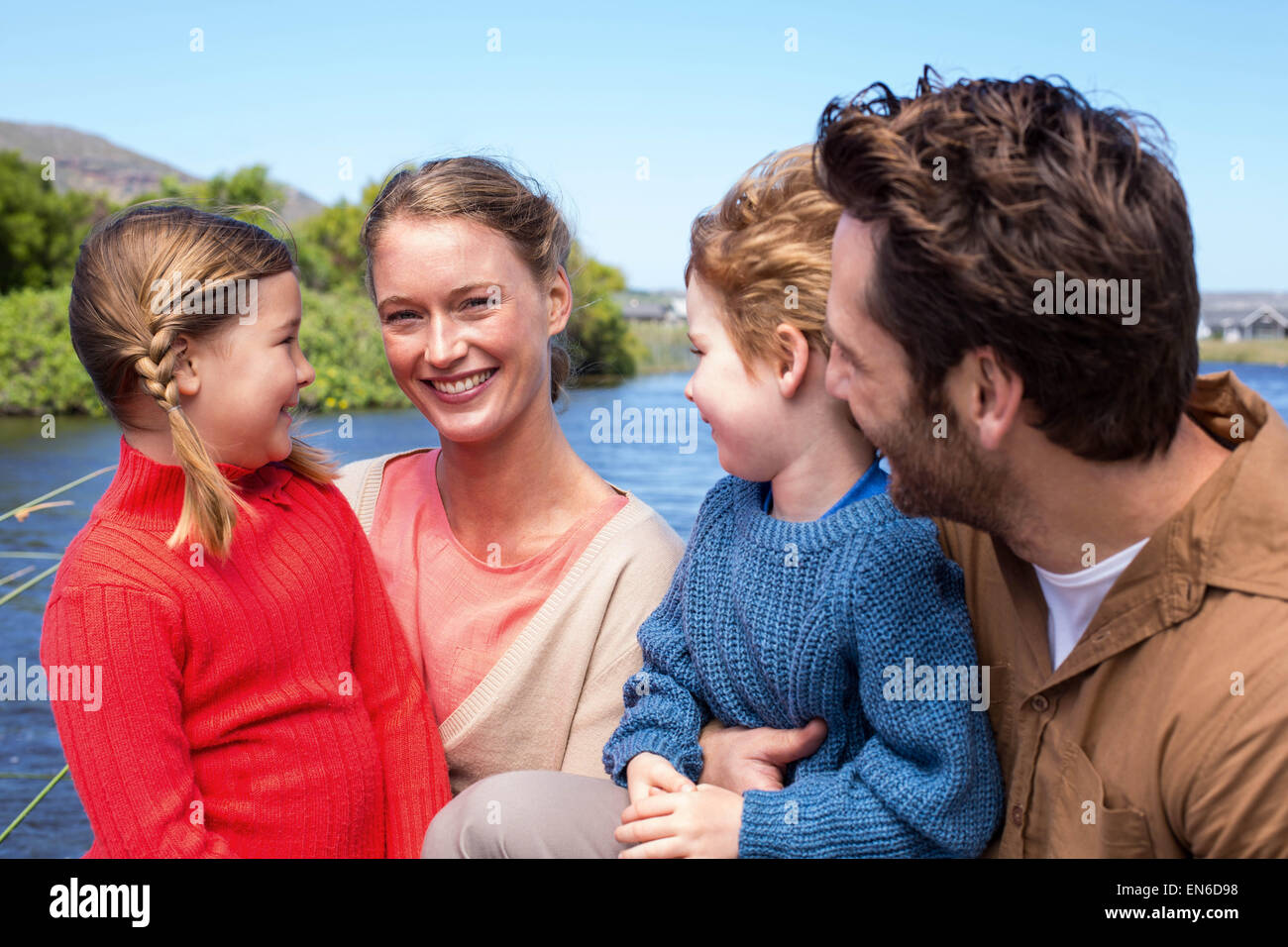 Happy family lake hi-res stock photography and images - Alamy