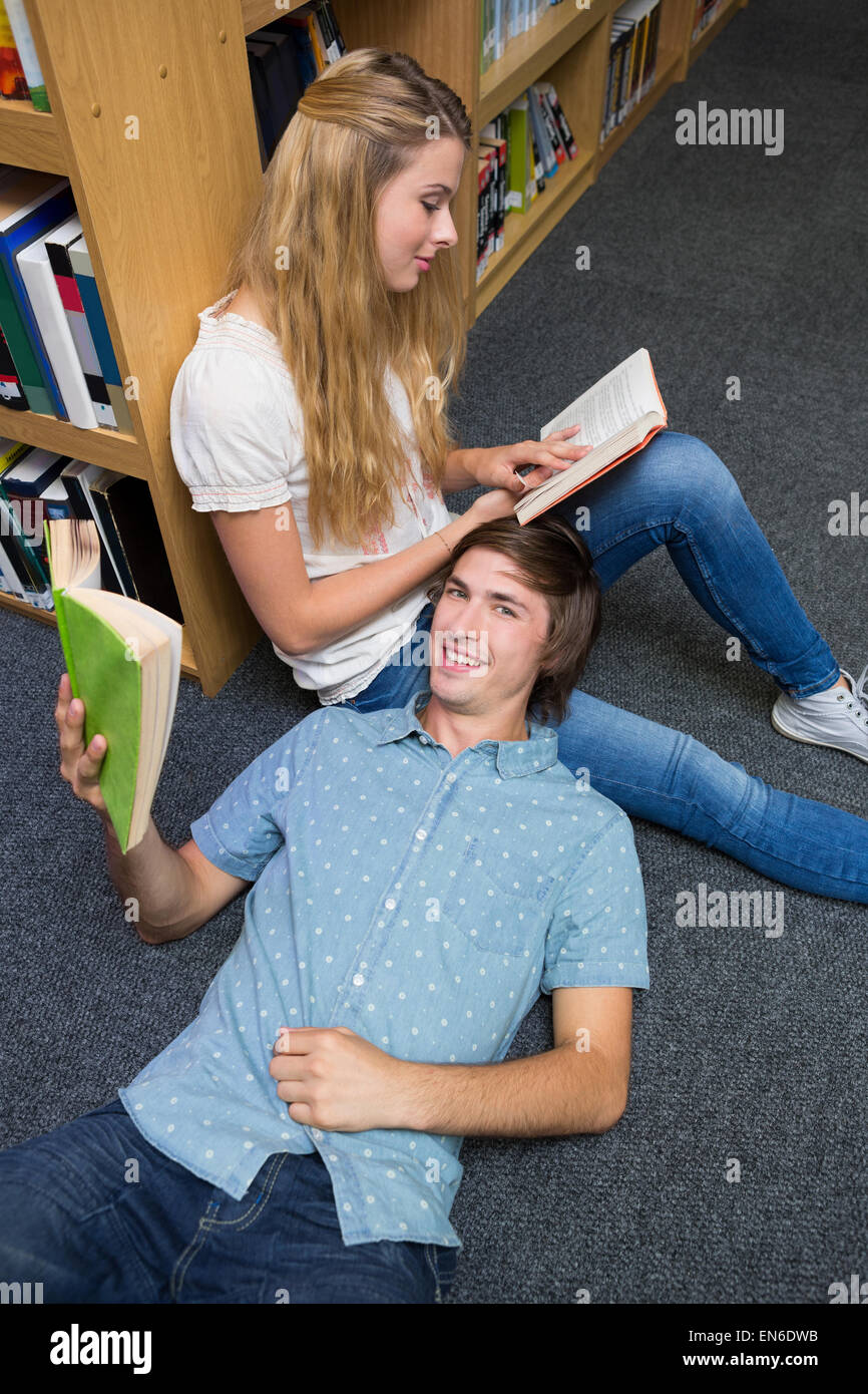 Students reading together in the library Stock Photo - Alamy