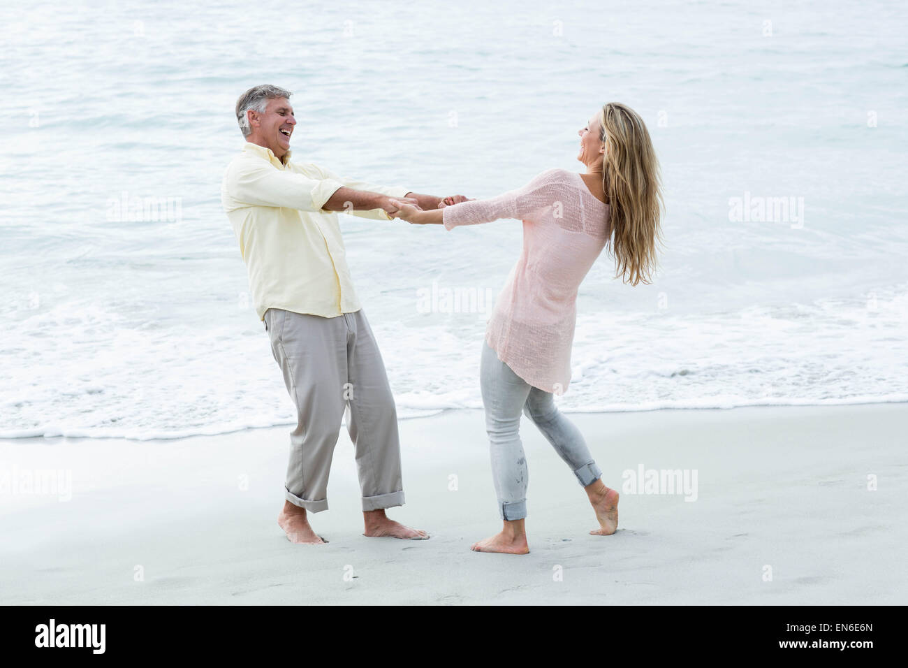 Happy couple having fun together Stock Photo - Alamy