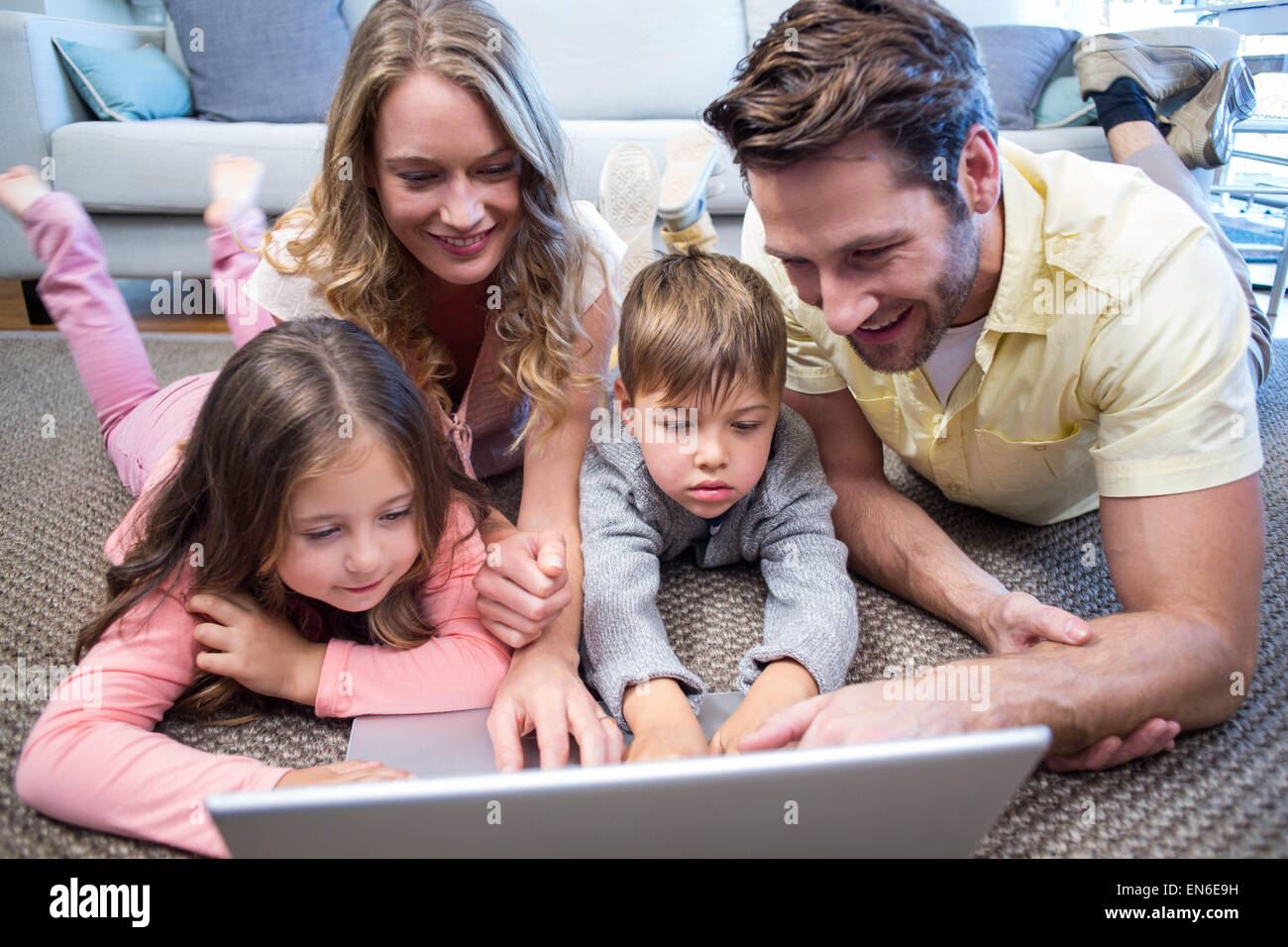 Woman laptop happy children hi-res stock photography and images - Alamy