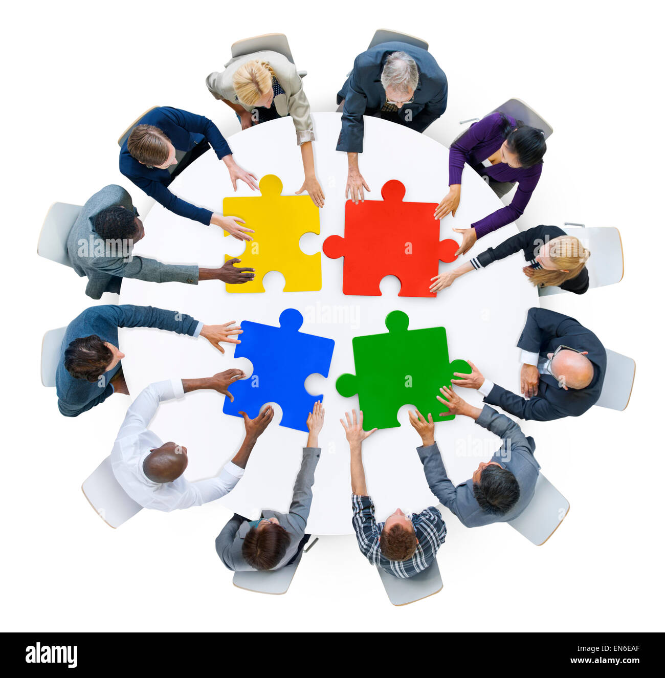 Business People with Jigsaw Puzzle and Teamwork Concept Stock Photo - Alamy