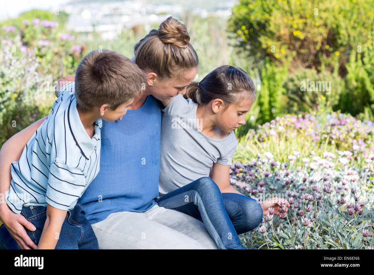 Children with flowers hi-res stock photography and images - Alamy