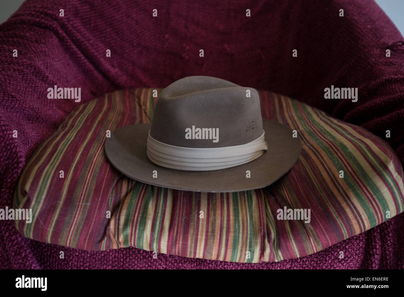 Mens hat on chair hi-res stock photography and images - Alamy
