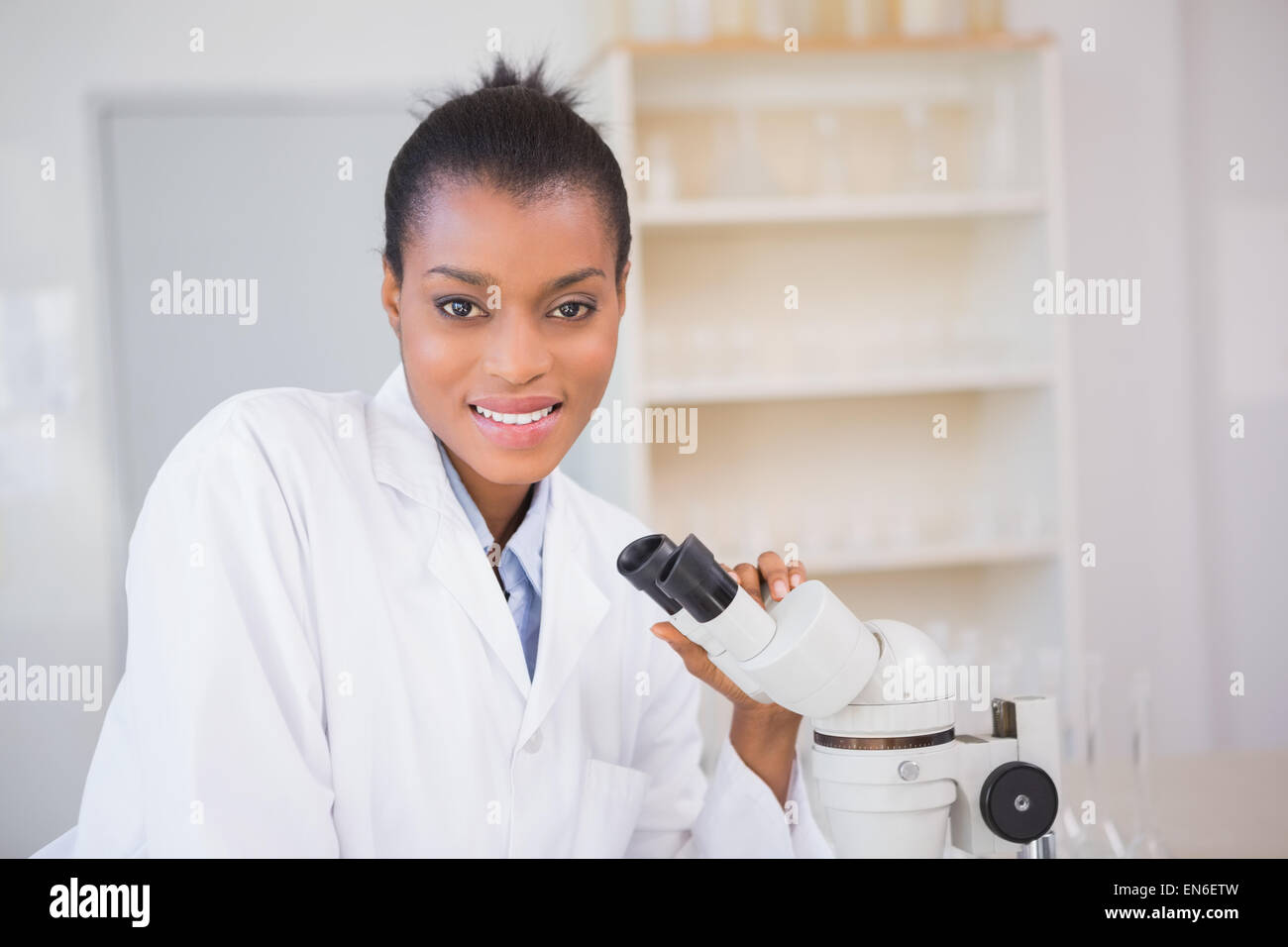 Smiling scientist hi-res stock photography and images - Alamy