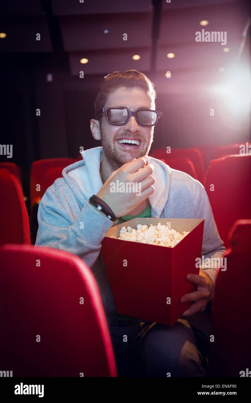 Young man watching a 3d film Stock Photo - Alamy