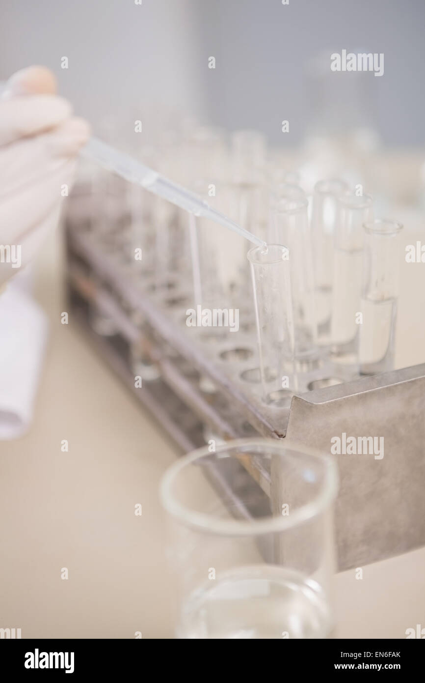 Scientist with test tube hi-res stock photography and images - Alamy