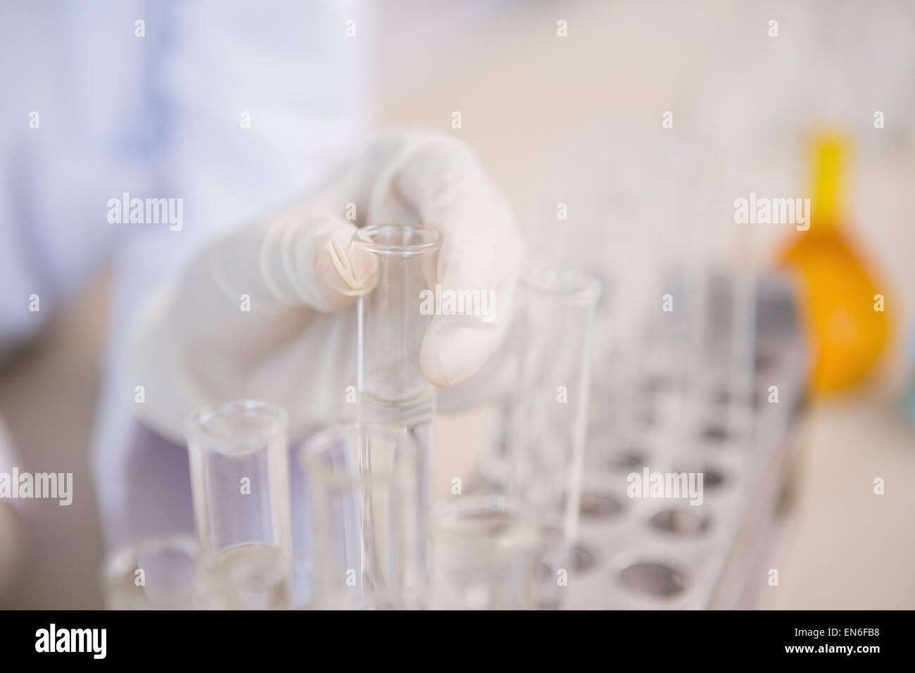 Scientist holding tube test hi-res stock photography and images - Alamy
