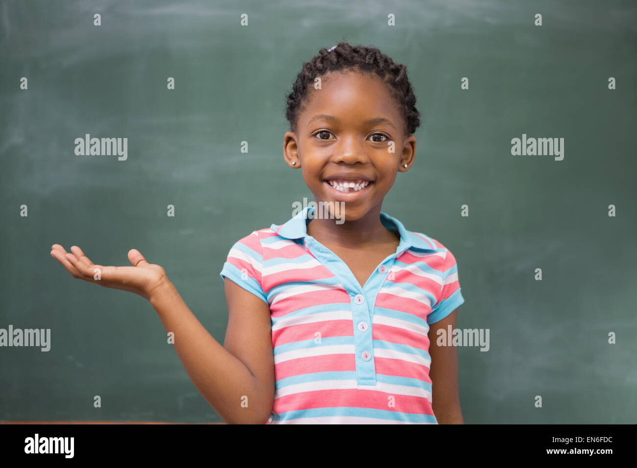 Smiling pupil raising her hand Stock Photo - Alamy Smiling pupil raising her hand Stock Photo - Alamy