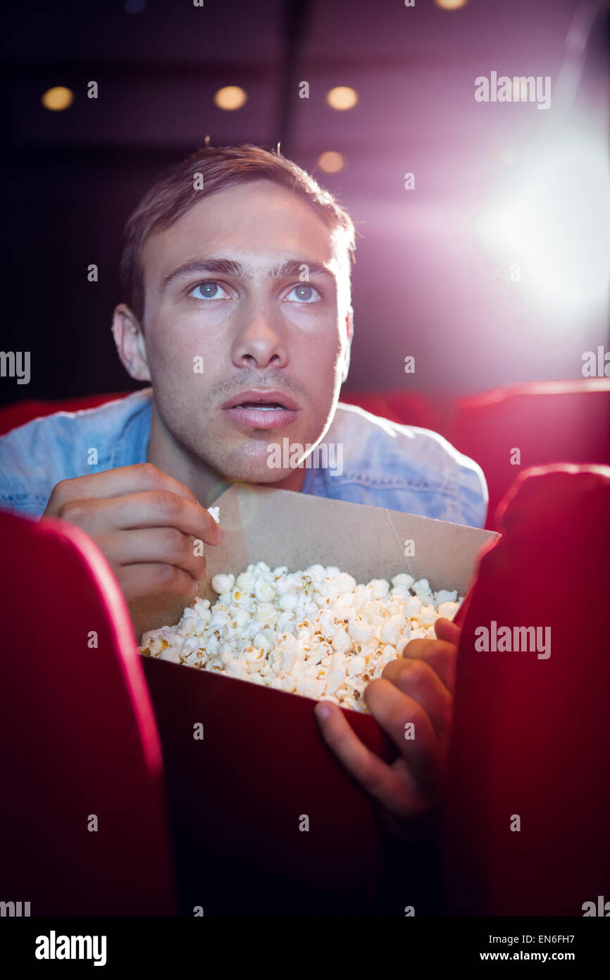 Young man cinema watching movie hi-res stock photography and images - Alamy