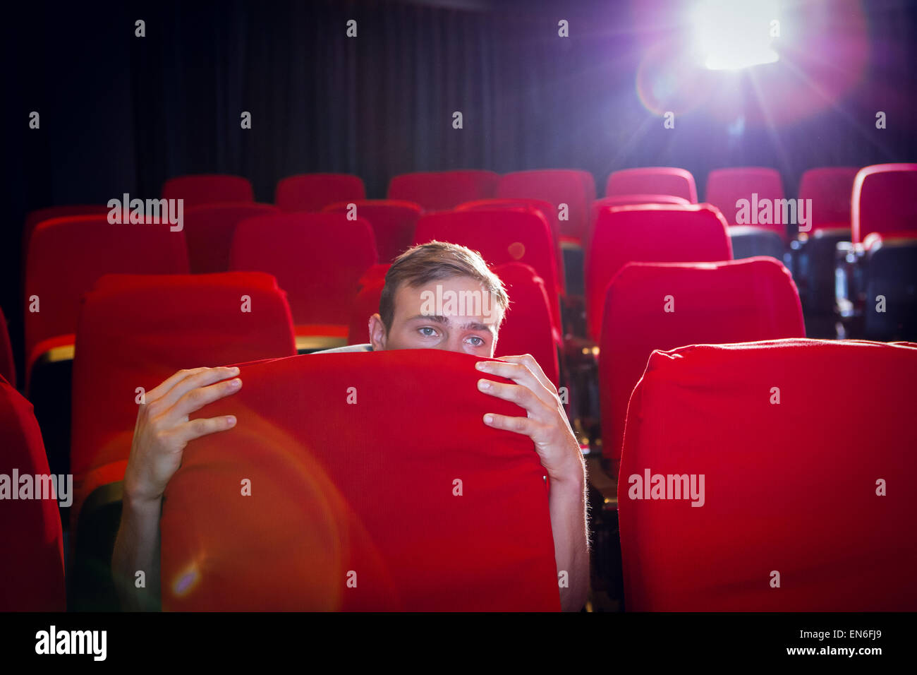 Watching Scary Movie Young Man Stock Photos & Watching Scary Movie ...