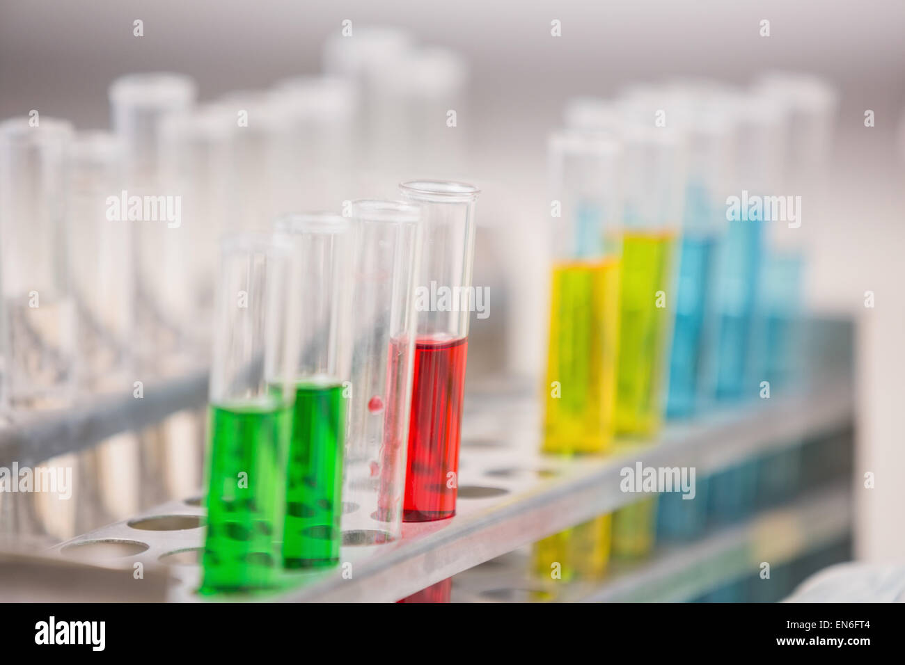 Test tubes with colorful fluid inside Stock Photo - Alamy