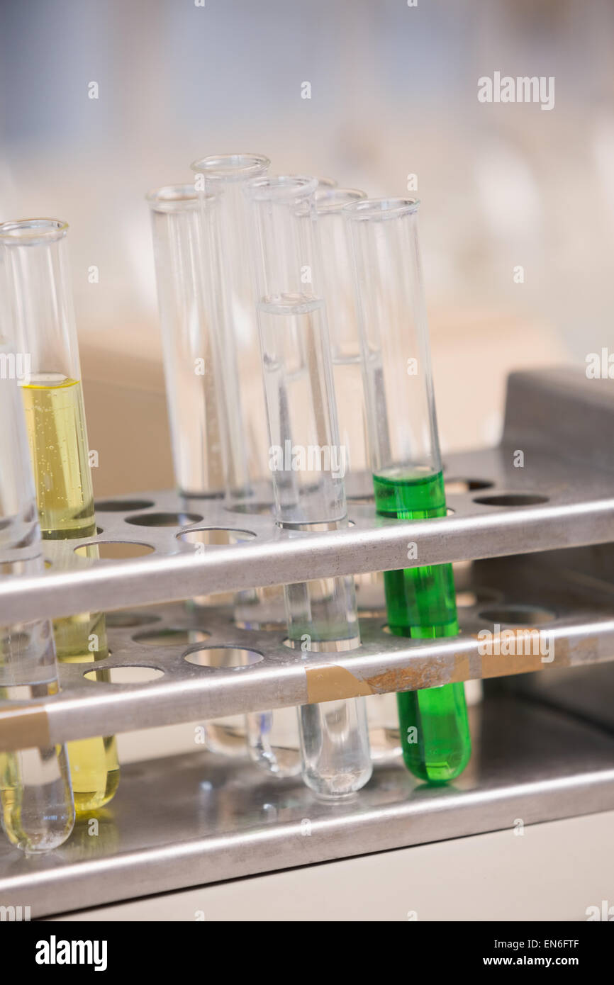 Test tubes with colorful fluid inside Stock Photo - Alamy