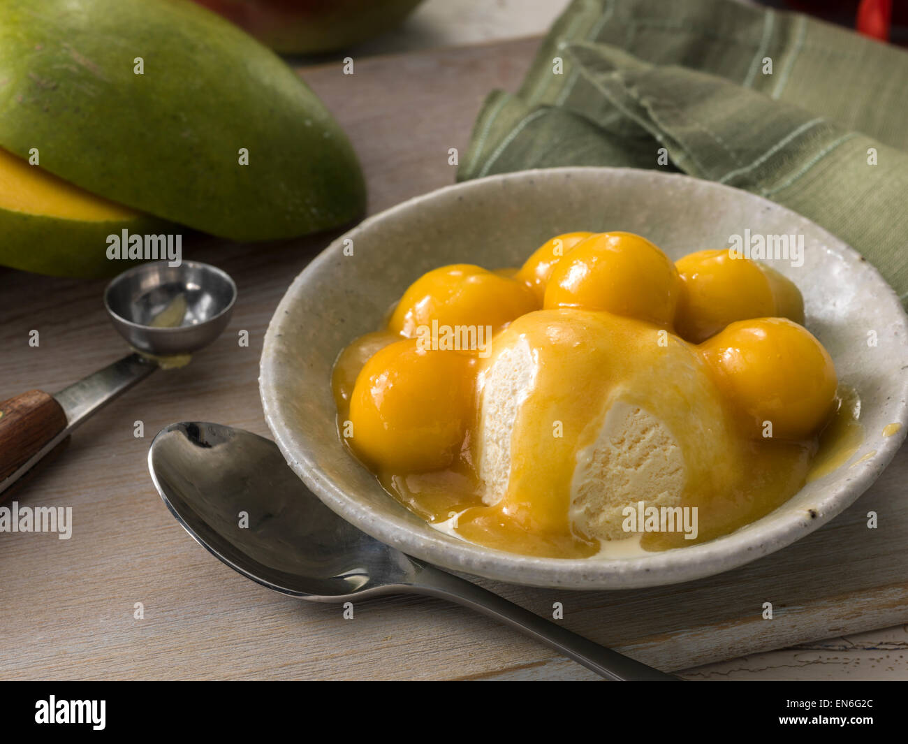 Mango jubilee flambe Stock Photo - Alamy