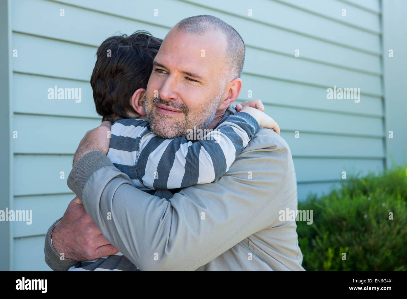 Father and son hugging Stock Photo - Alamy