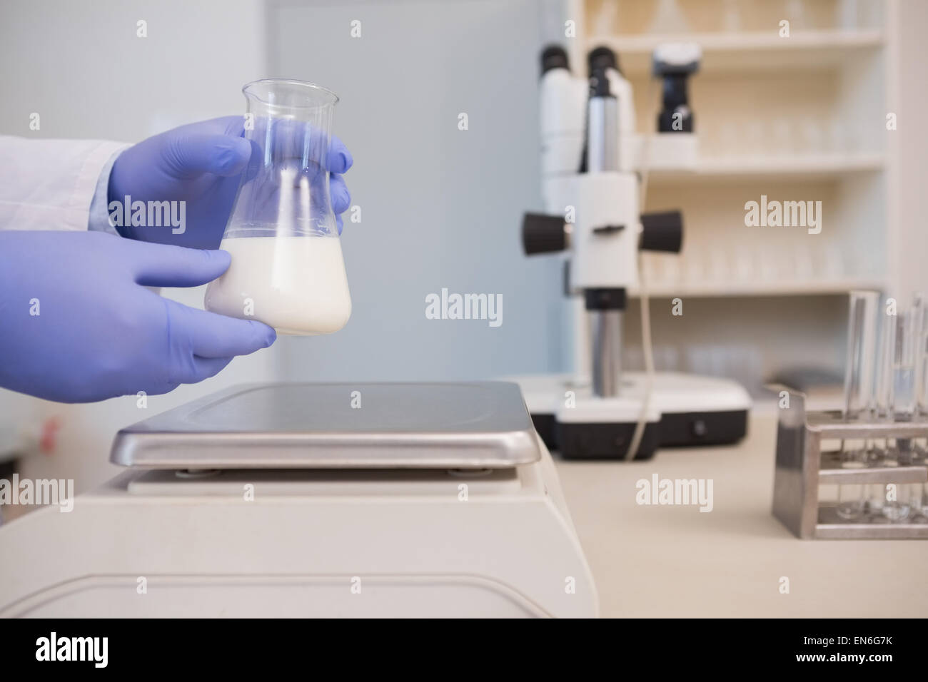 Man beaker scientist liquid hi-res stock photography and images - Alamy