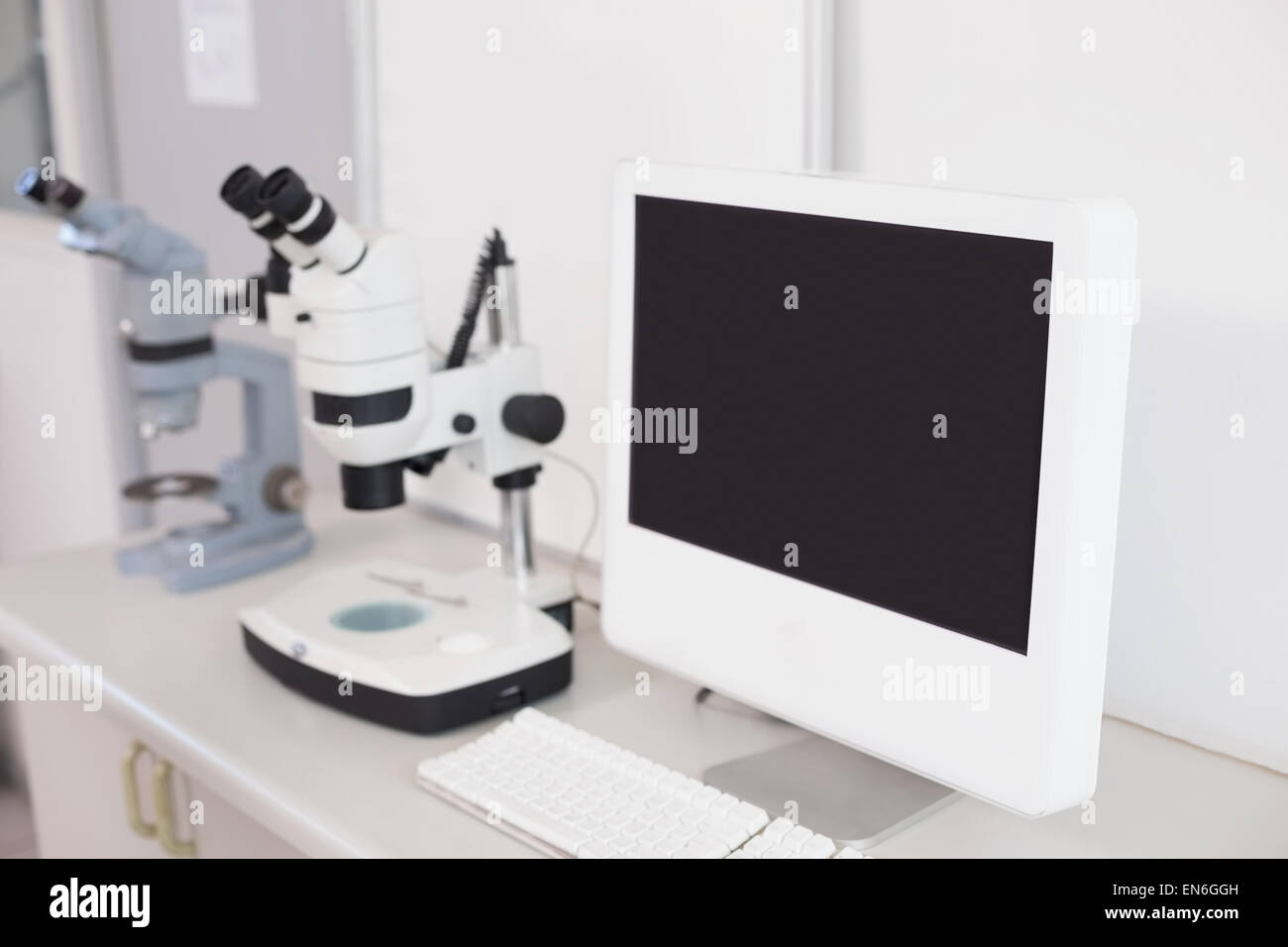 Microscope and computer Stock Photo - Alamy