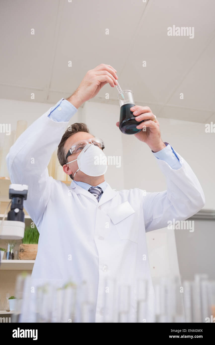 Scientist with flask hi-res stock photography and images - Alamy