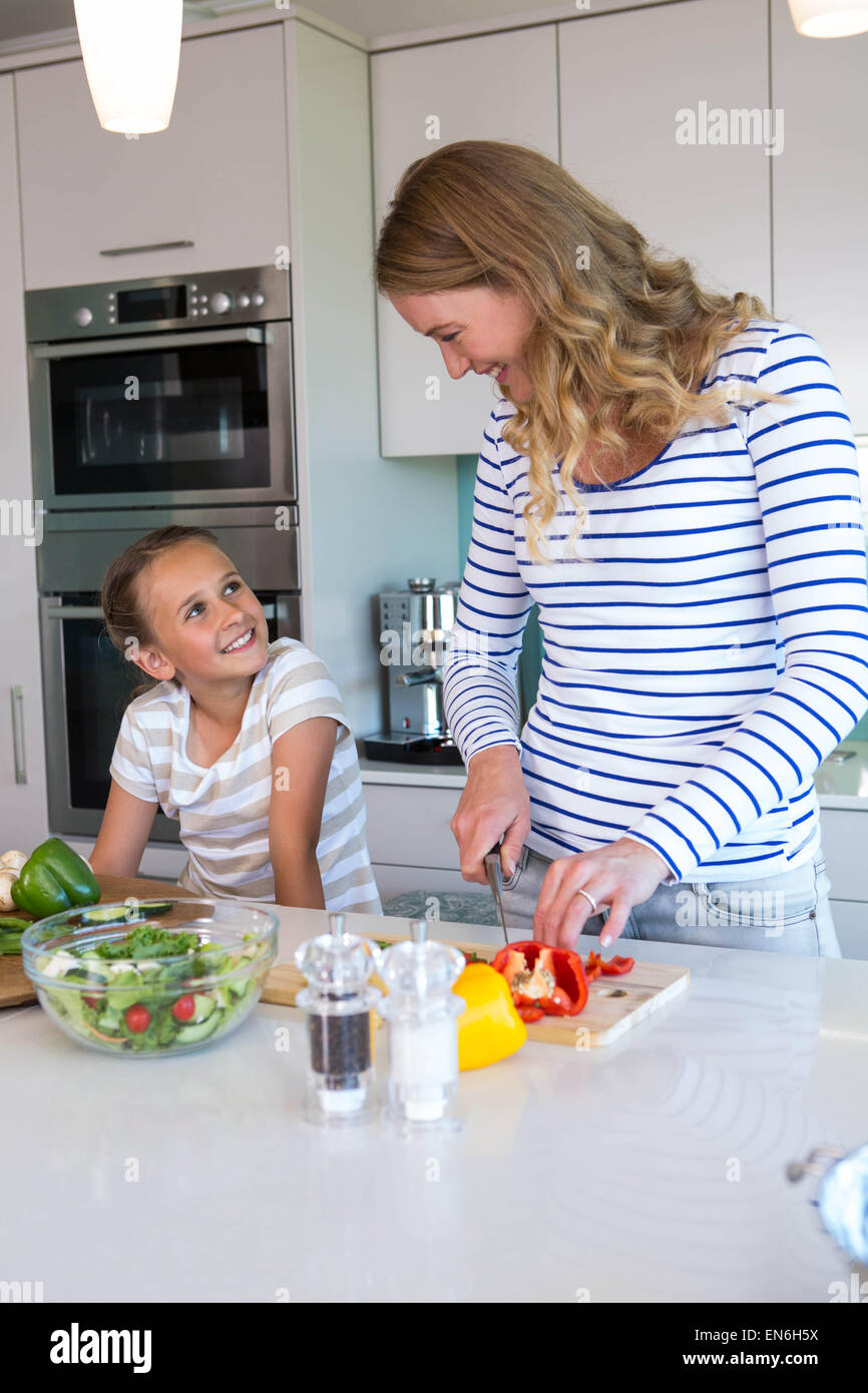 Happy family preparing lunch together Stock Photo - Alamy