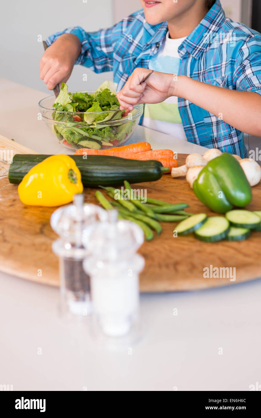 Little boy preparing lunch Stock Photo - Alamy