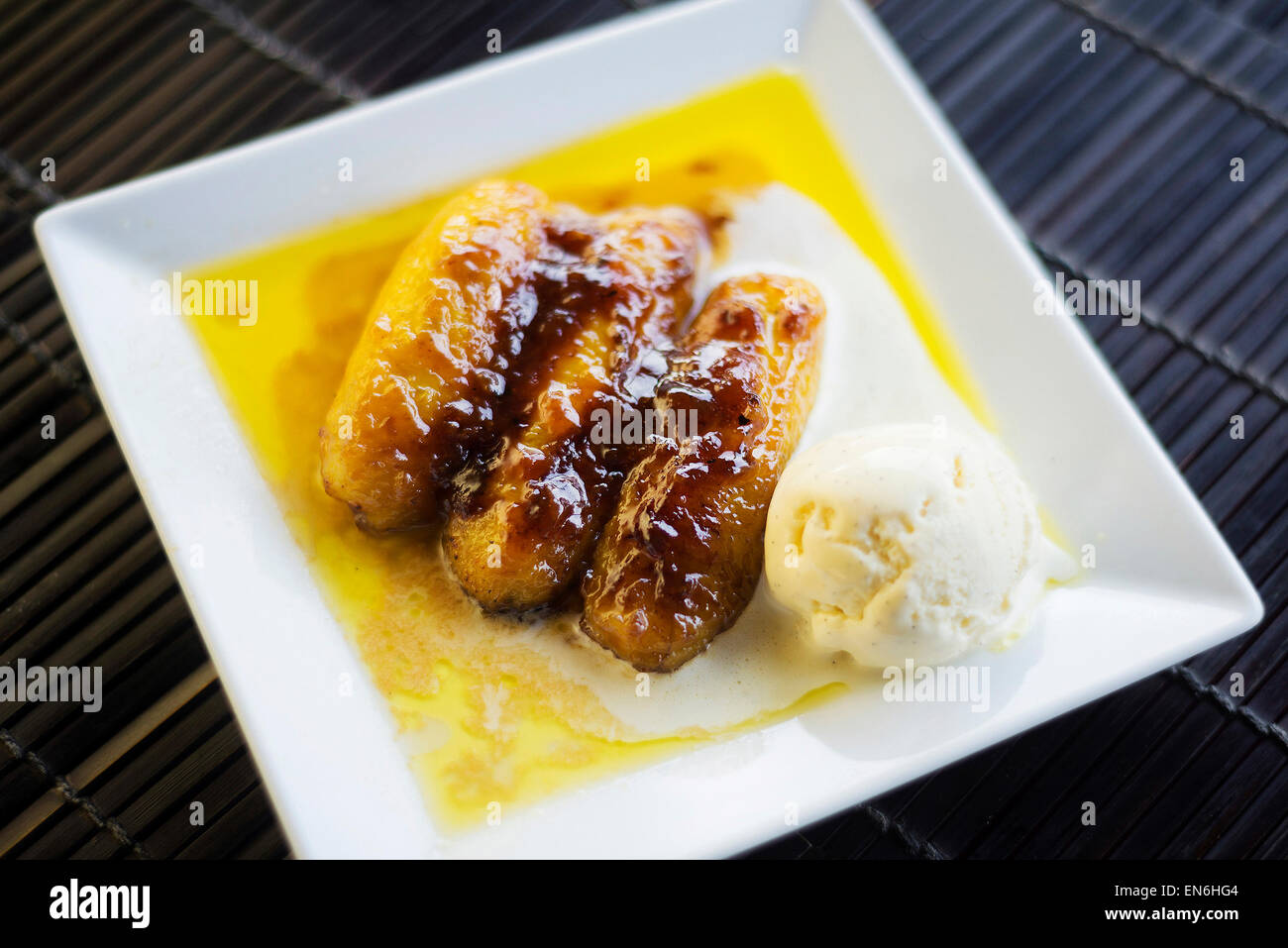 bananas caramel flambe with vanilla ice cream dessert Stock Photo - Alamy