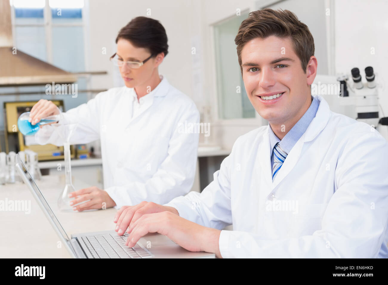 Scientist computer beaker hi-res stock photography and images - Alamy
