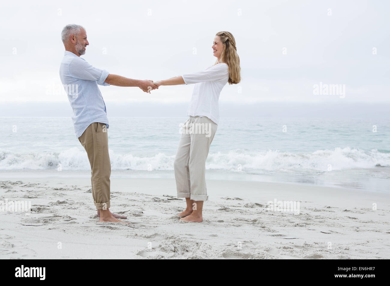 Happy couple having fun together Stock Photo - Alamy