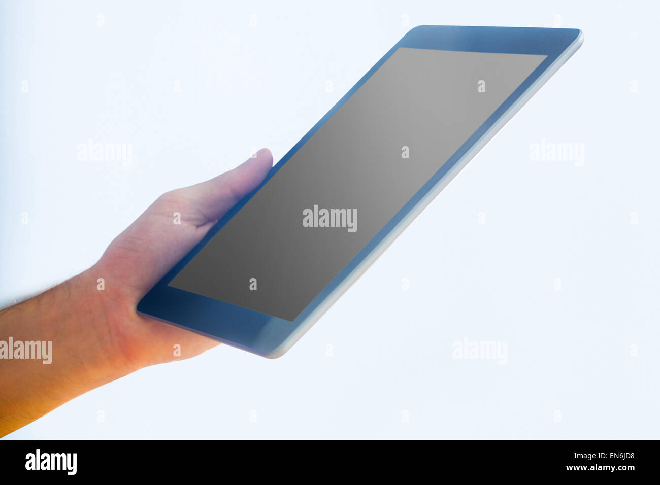 Hand holding tablet hi-res stock photography and images - Alamy