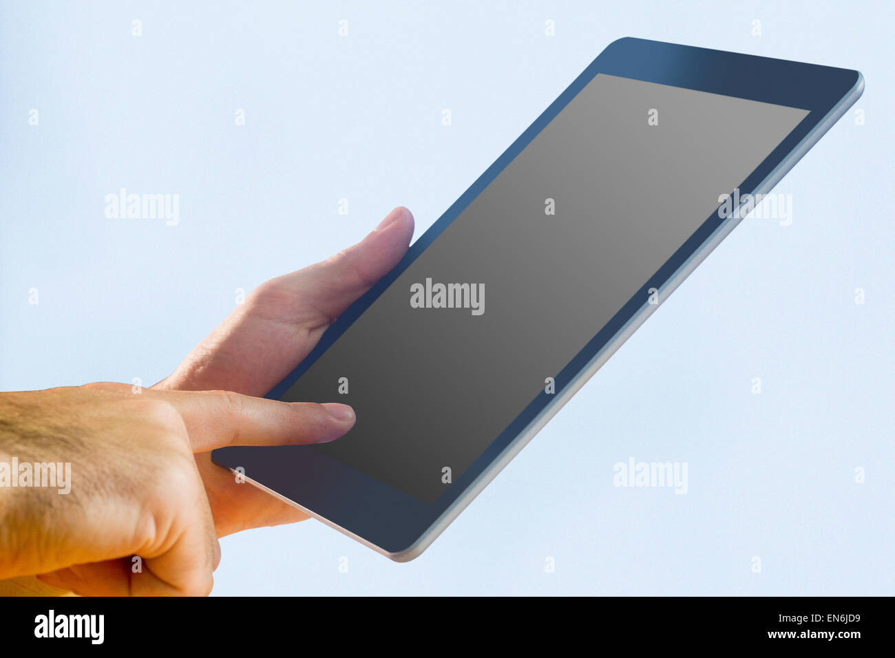 Hand holding tablet hi-res stock photography and images - Alamy