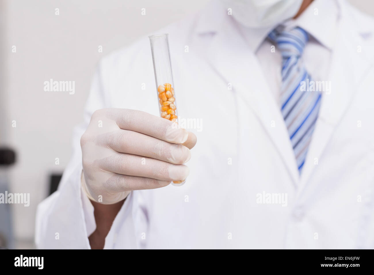 Scientist holding tube test hi-res stock photography and images - Alamy