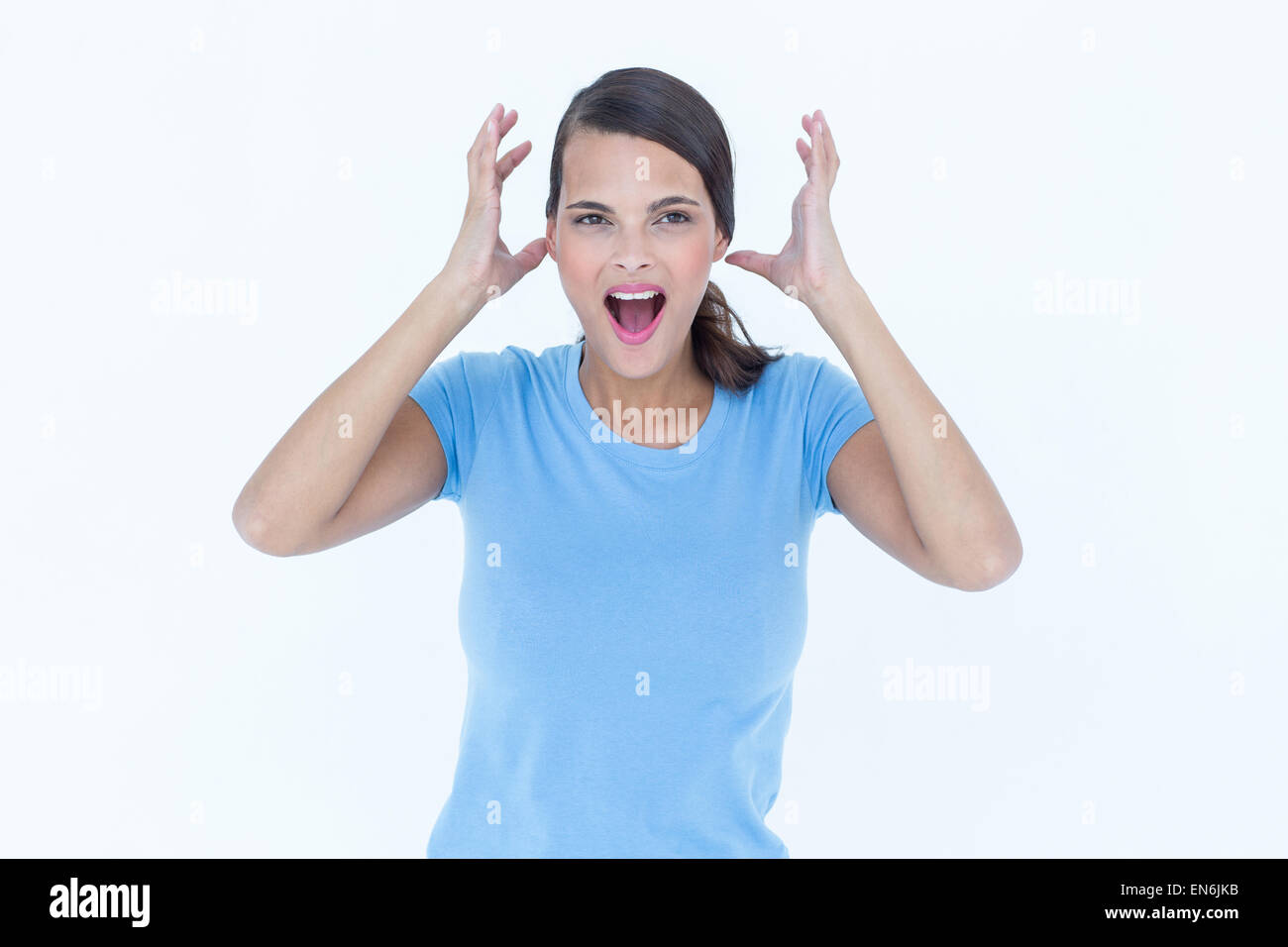 Angry woman raising her hands up Stock Photo - Alamy