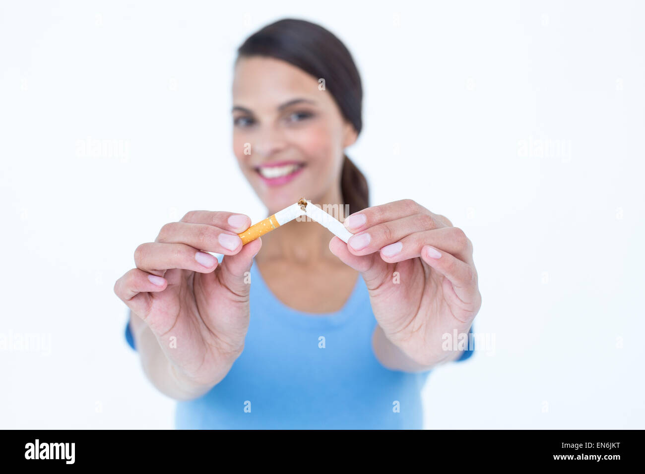 Brunette smoking cigarette hi-res stock photography and images - Alamy