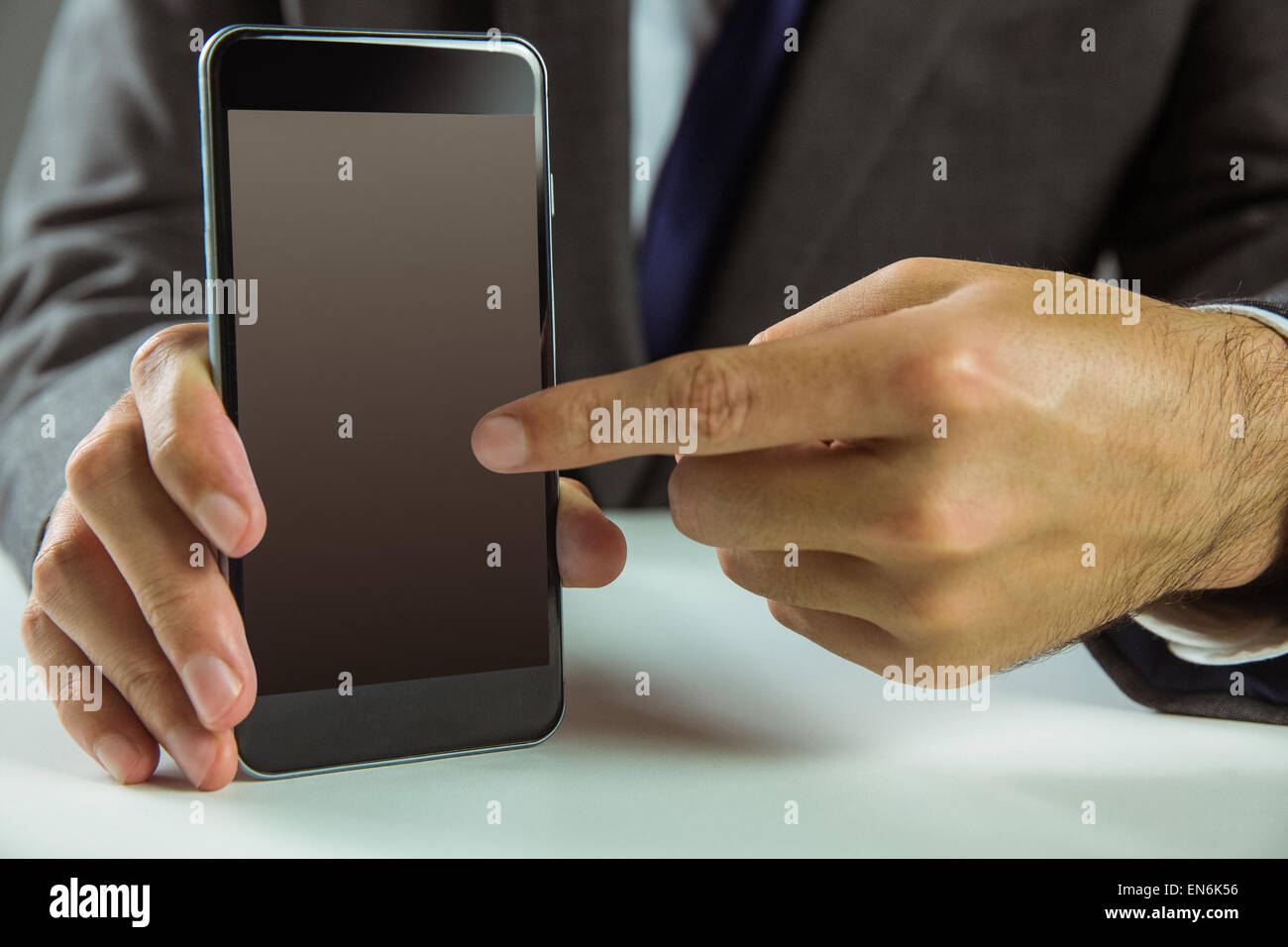 Finger pointing smart phone hi-res stock photography and images - Alamy