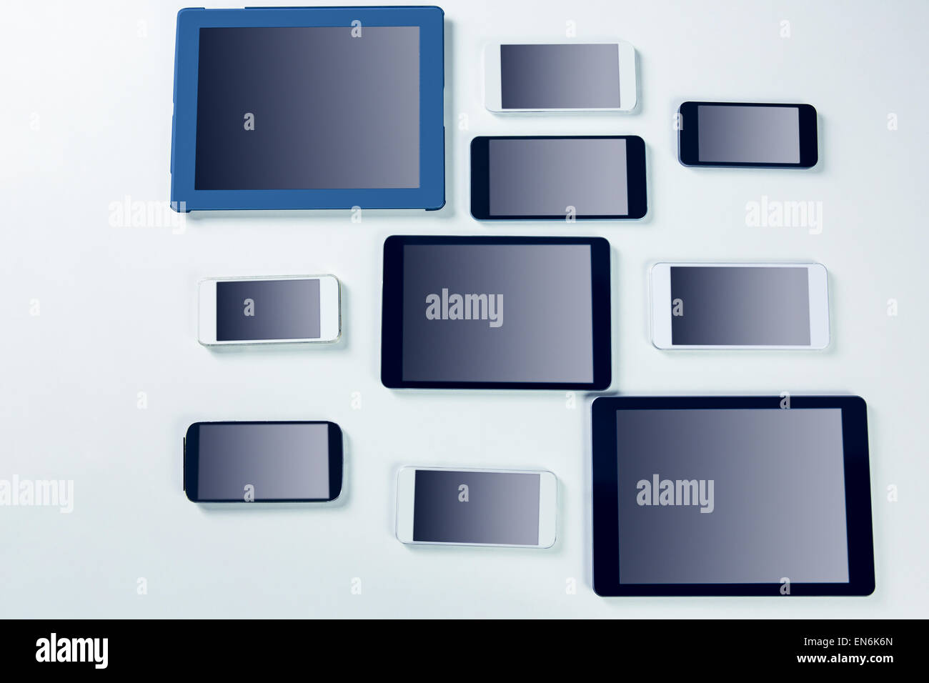 Overhead of smartphones and tablets Stock Photo - Alamy