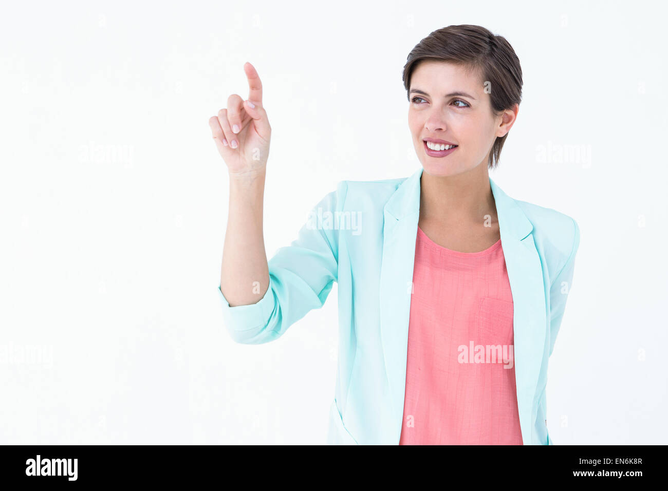 Woman pointing something Stock Photo - Alamy