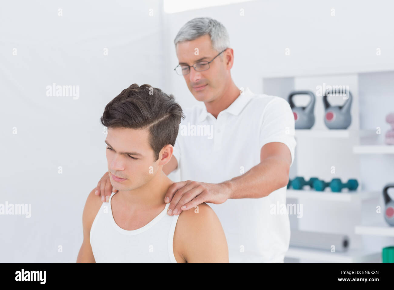 Doctor doing back adjustment Stock Photo - Alamy