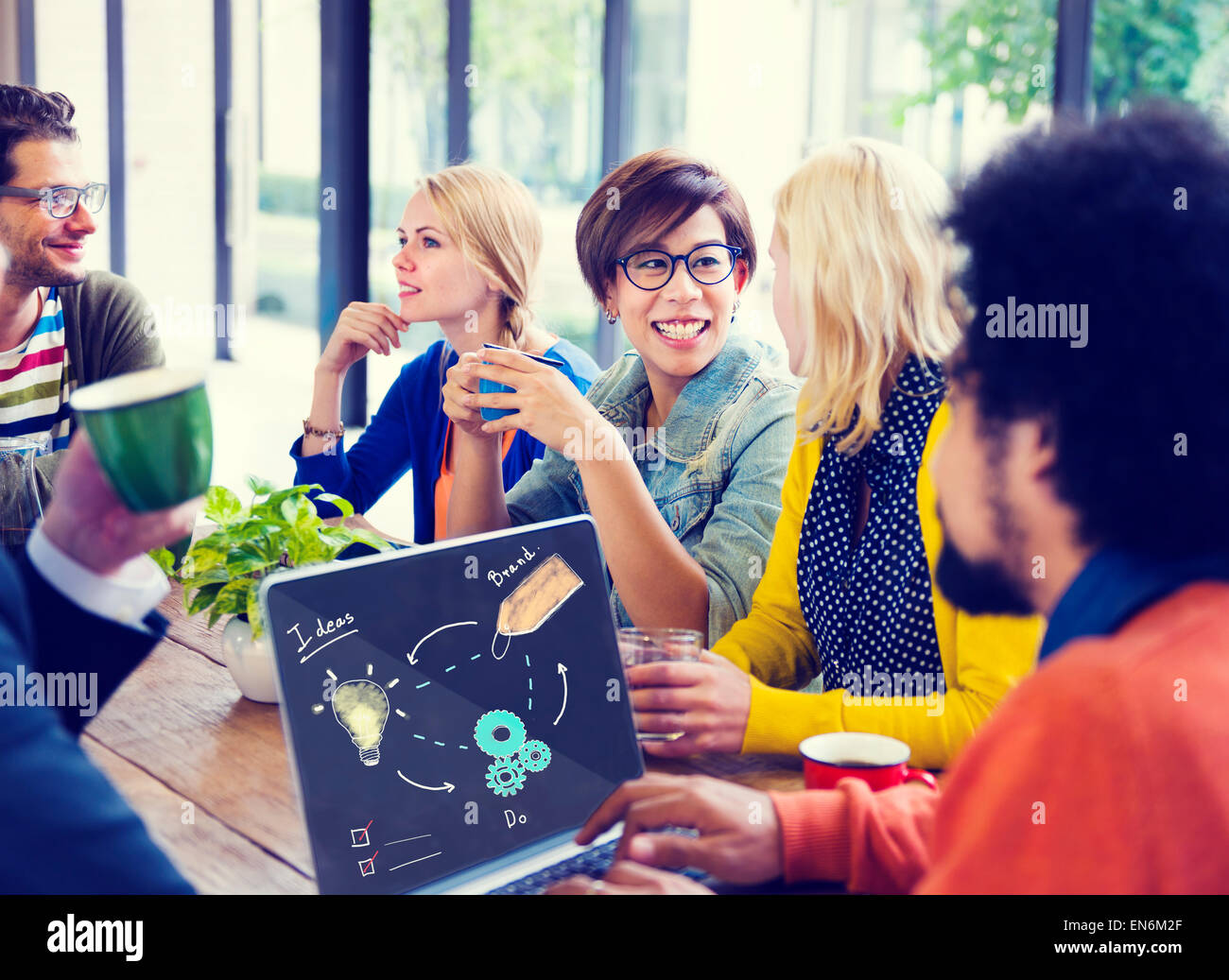 Group of Friends Having a Coffee Break in a Cafe Stock Photo - Alamy
