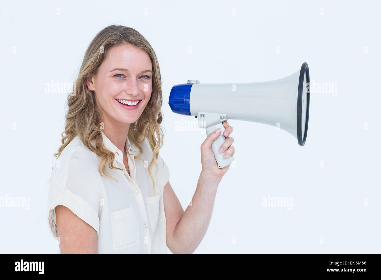 Woman speaking through a loudspeaker Stock Photo - Alamy