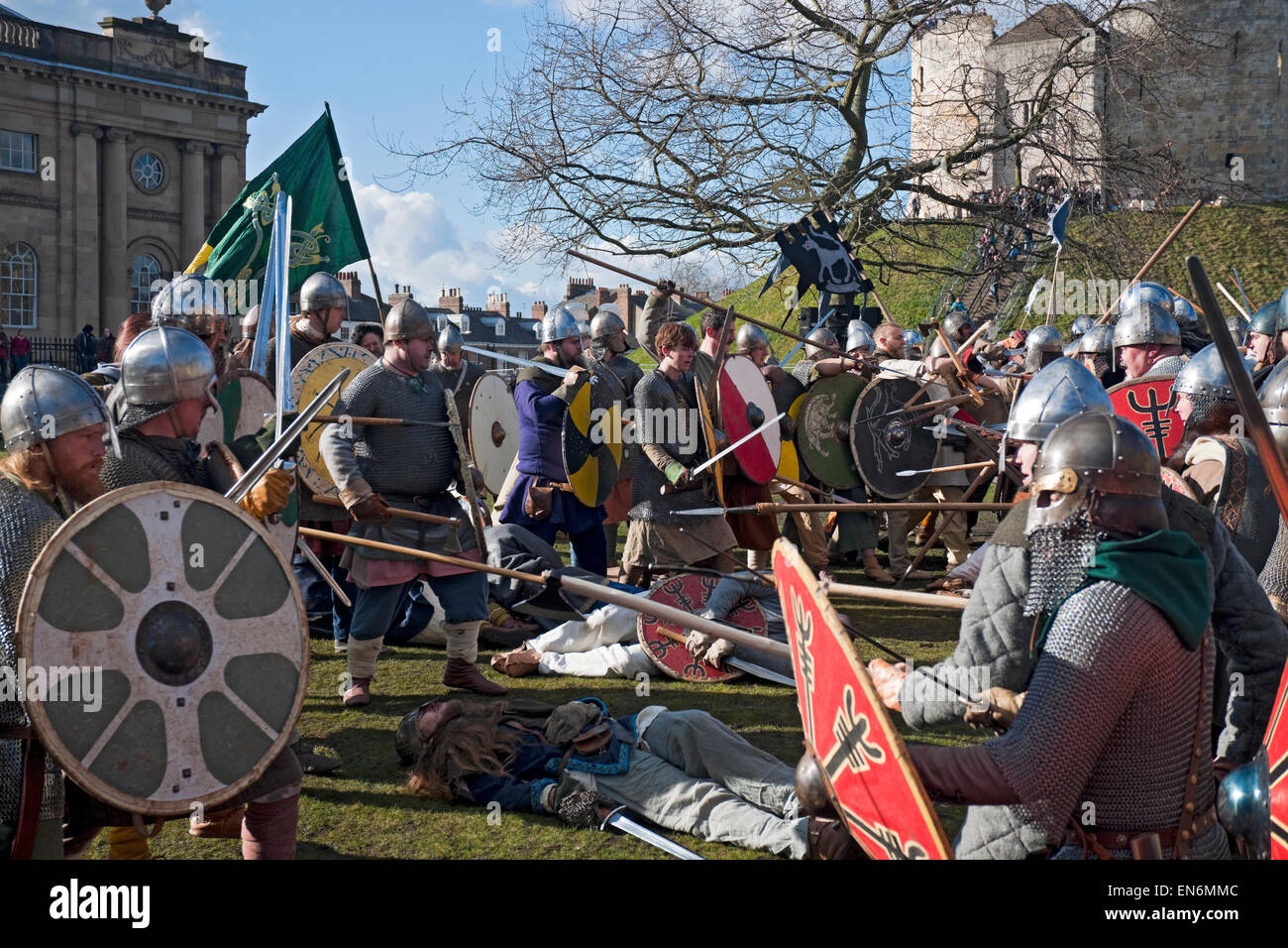 People in costume as Vikings and Saxons fight in combat at the annual ...