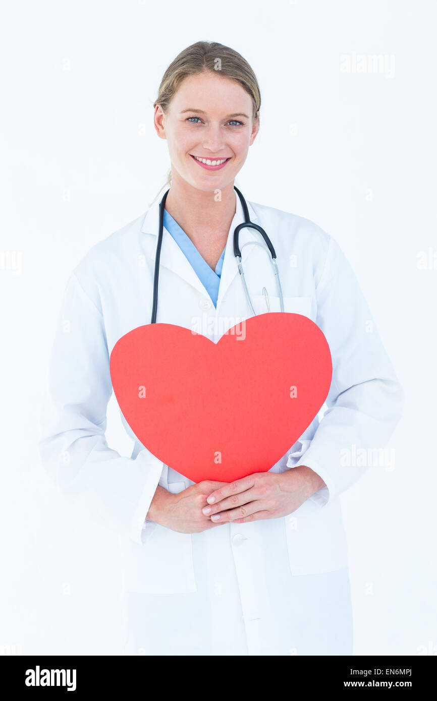Doctor holding red heart card Stock Photo - Alamy Doctor holding red heart card Stock Photo - Alamy
