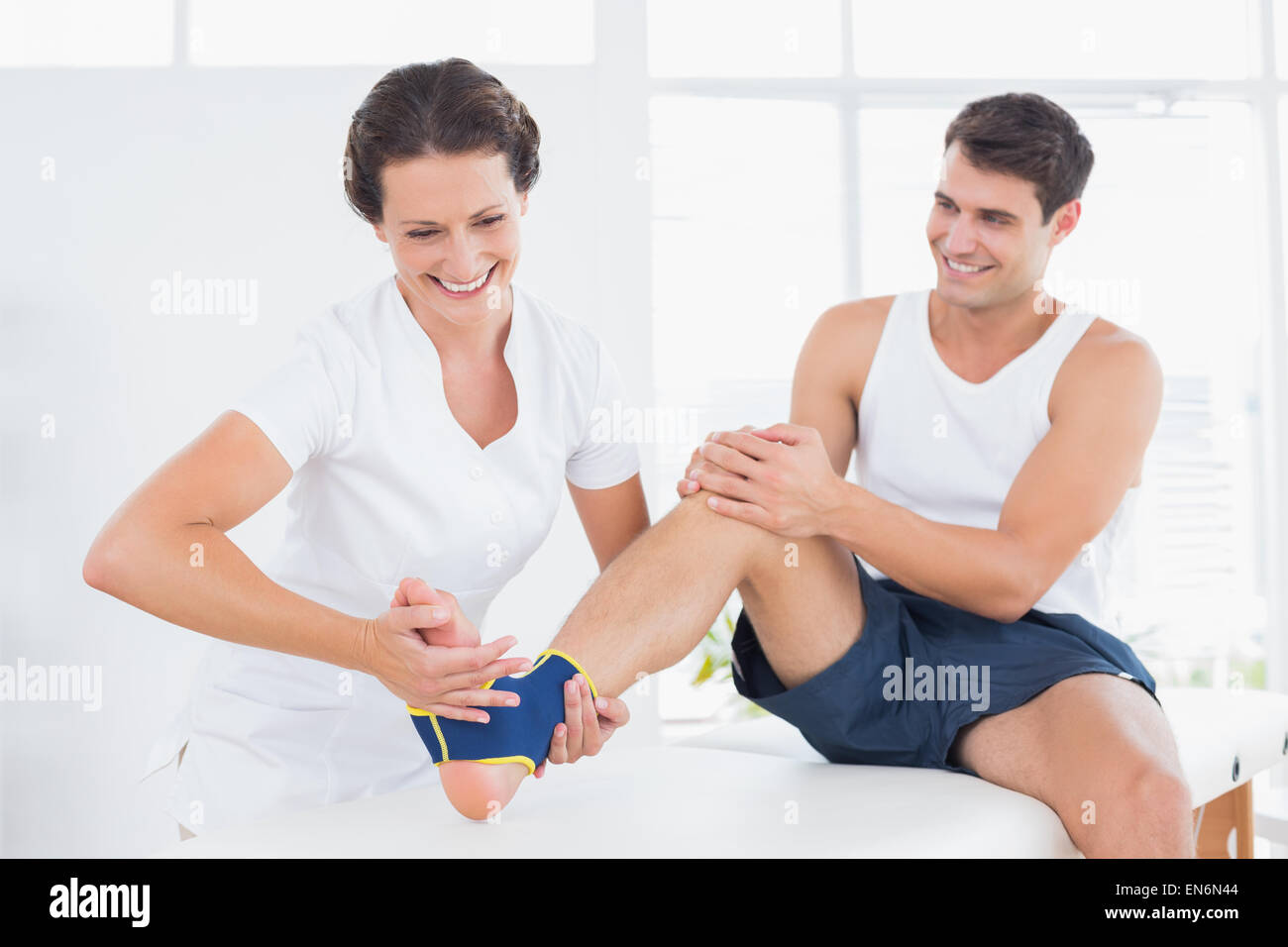Doctor examining foot hi-res stock photography and images - Alamy