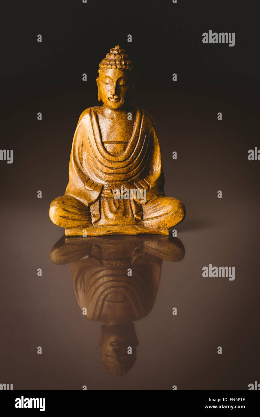 Wooden buddha statue hi-res stock photography and images - Alamy