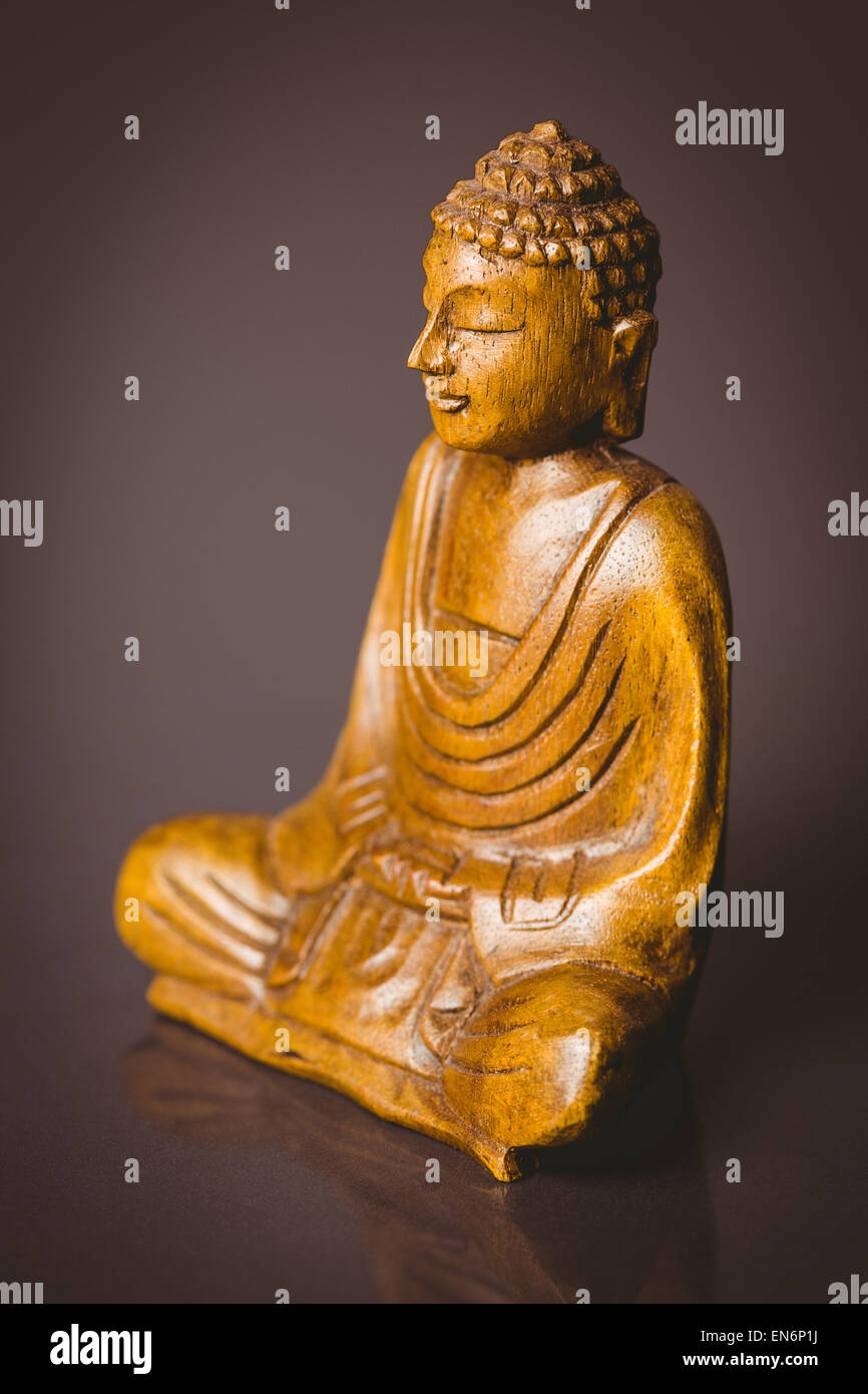 Wooden buddha statue Stock Photo - Alamy