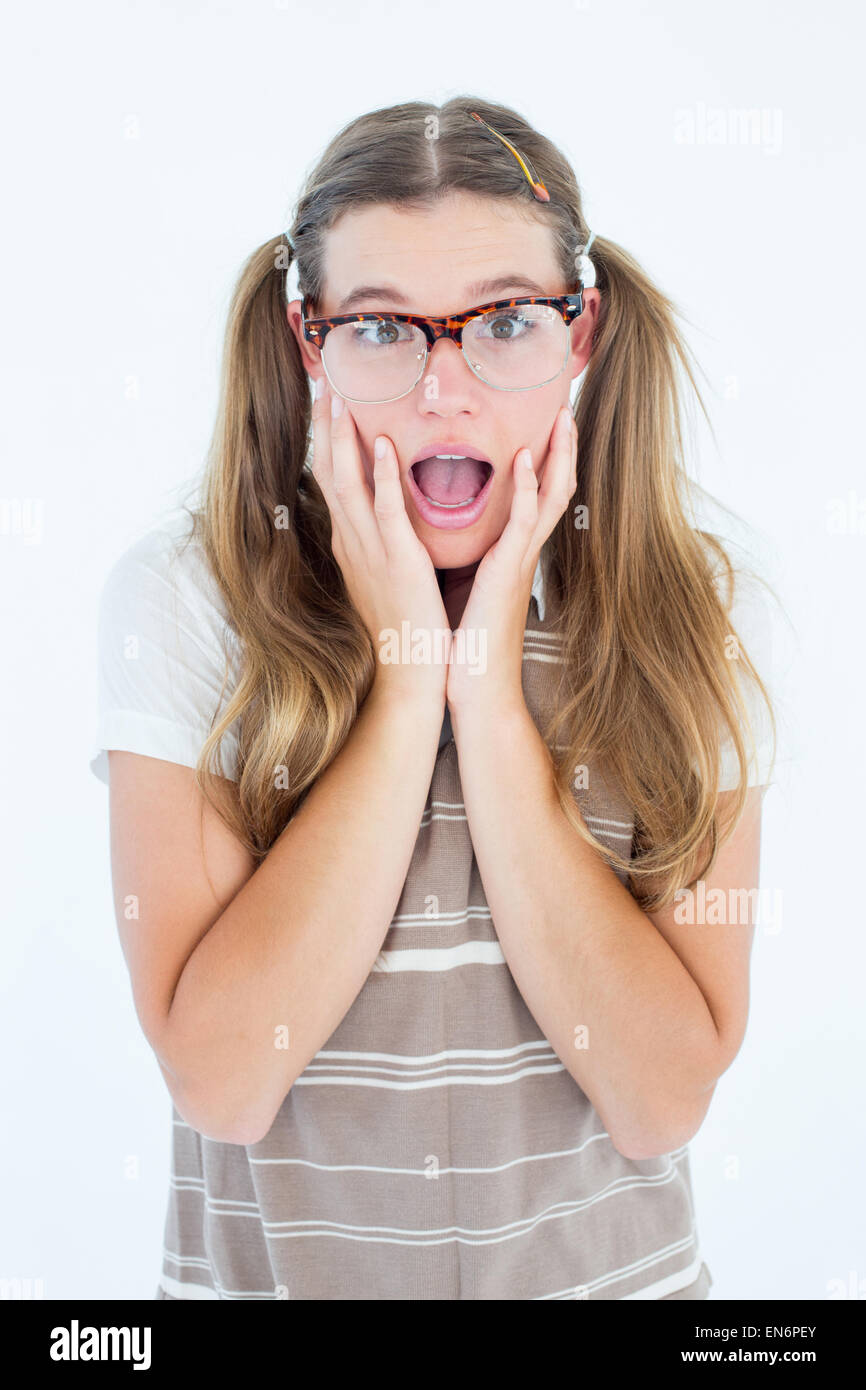 Surprised geeky hipster looking at camera Stock Photo - Alamy