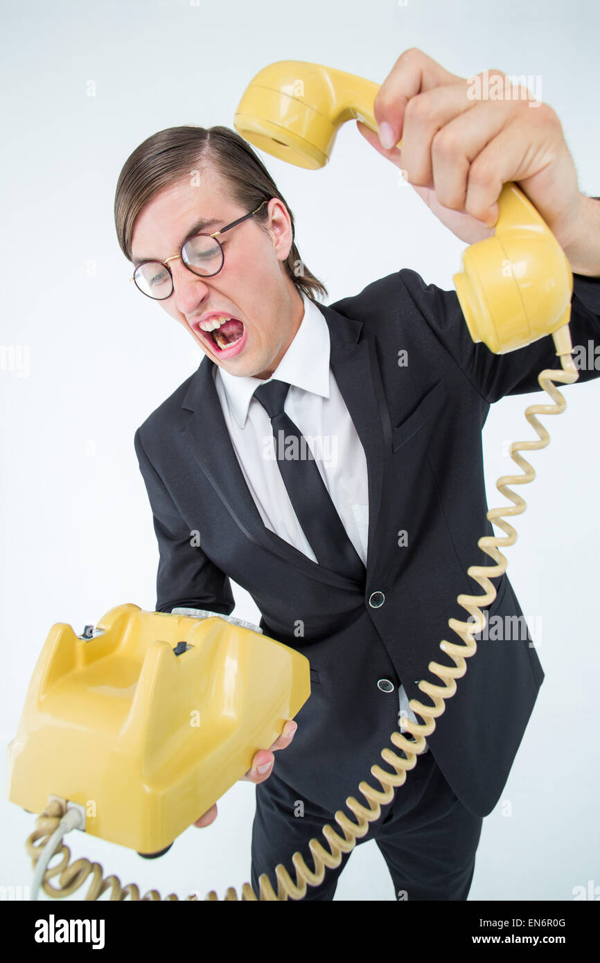 Geeky businessman shouting and hanging up the telephone Stock Photo - Alamy