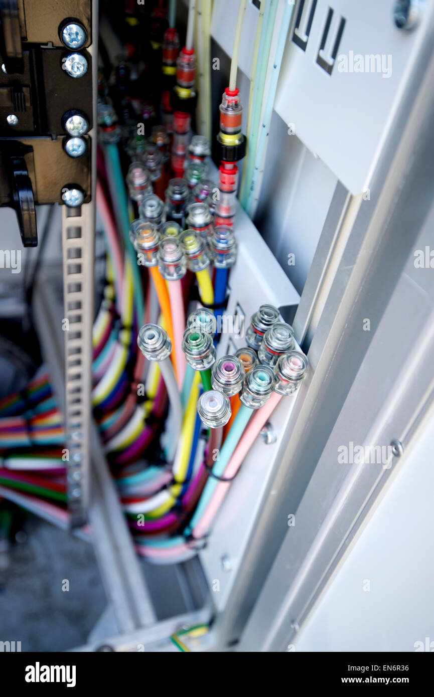 Men laying optical fiber cables Stock Photo - Alamy