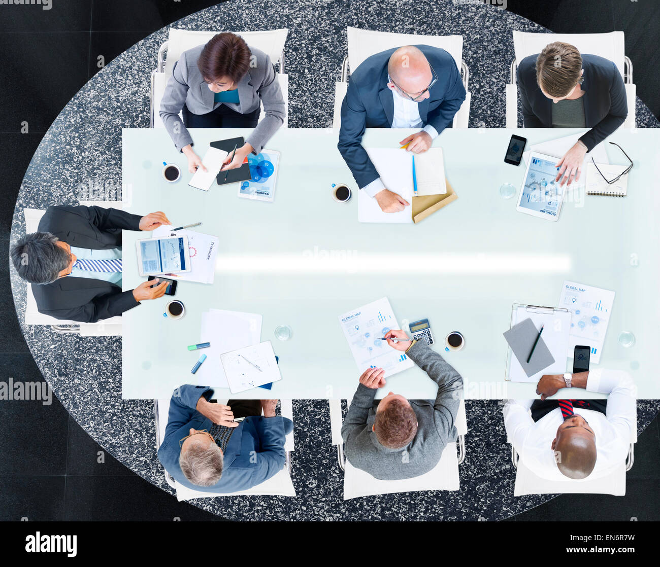Diverse business people having meeting hi-res stock photography and ...