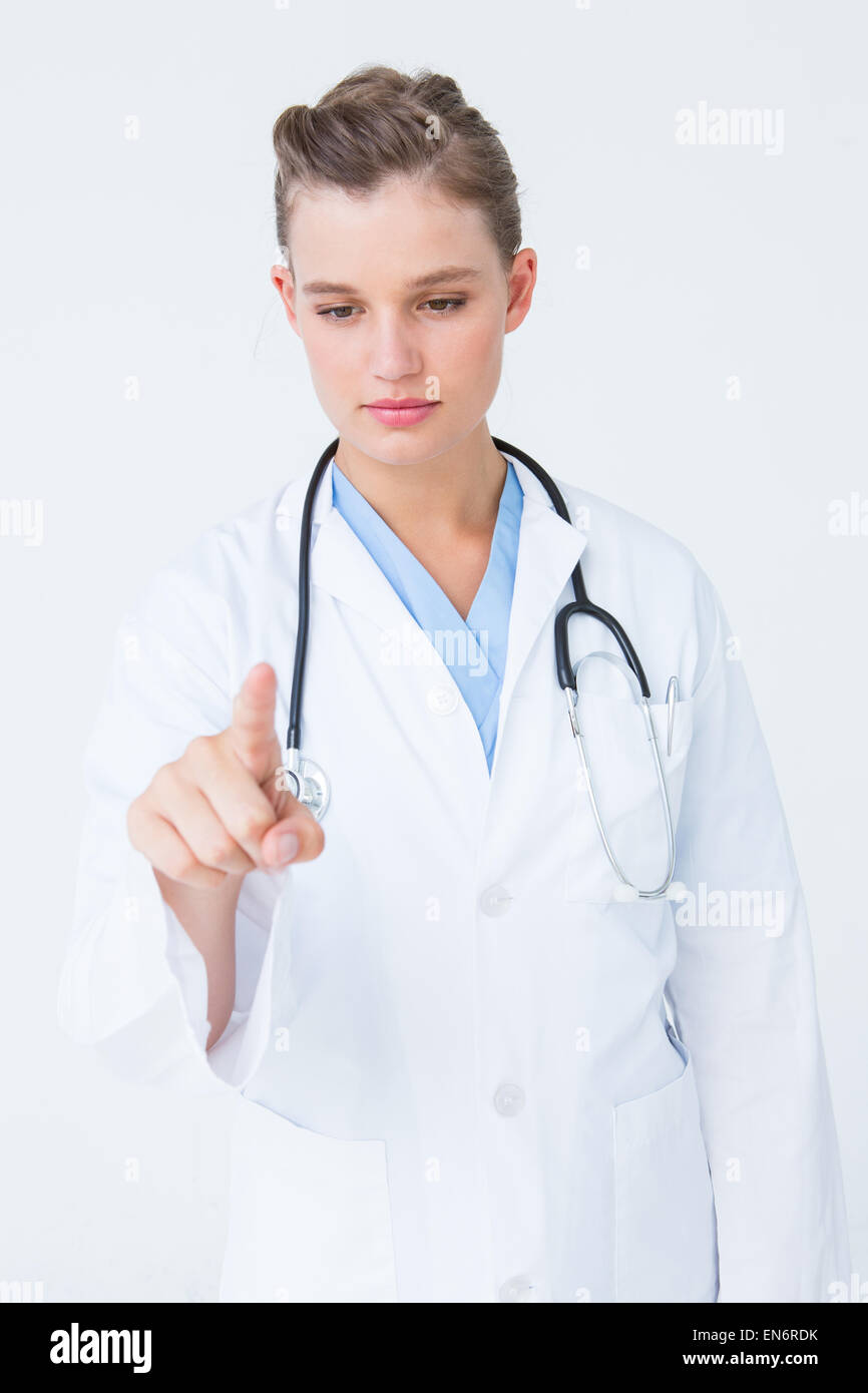 Female doctor touching virtual hi-res stock photography and images - Alamy